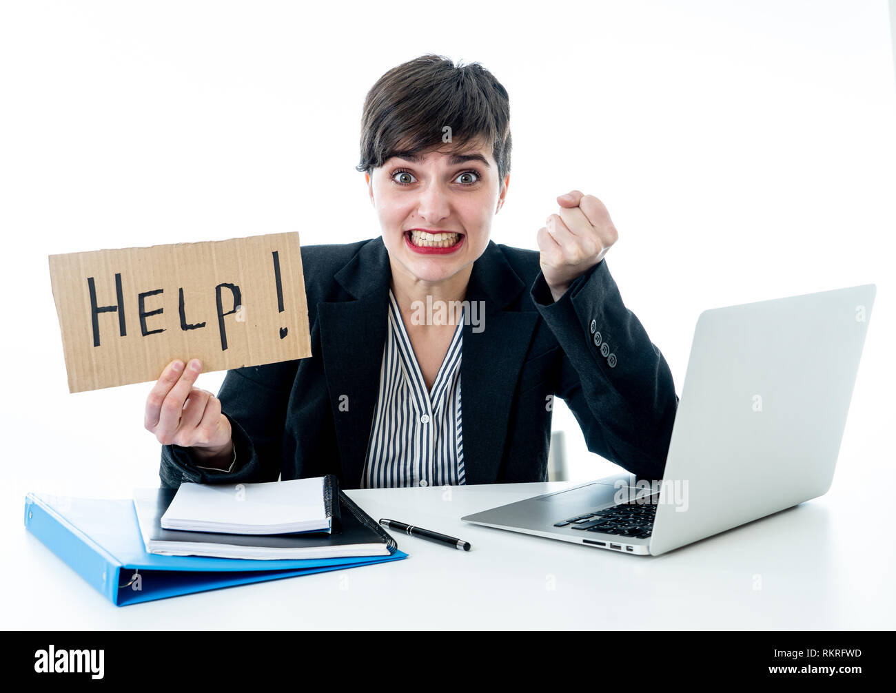 Tired and frustrated young attractive business woman working on ...