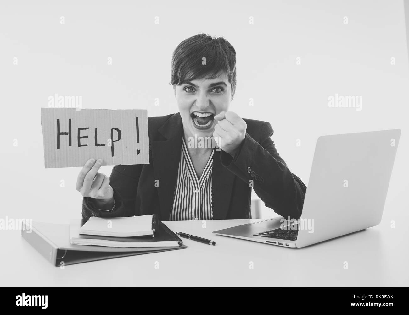 Beautiful young woman working on Black and White Stock Photos & Images ...