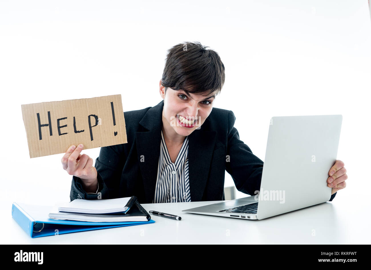 Tired and frustrated young attractive business woman working on ...