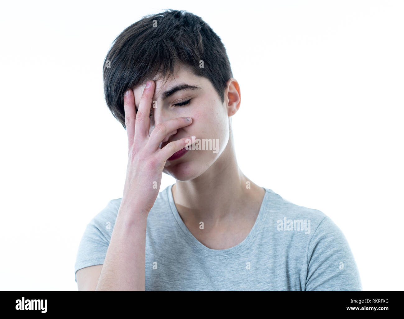 Close up portrait of beautiful young caucasian woman looking sad and ...