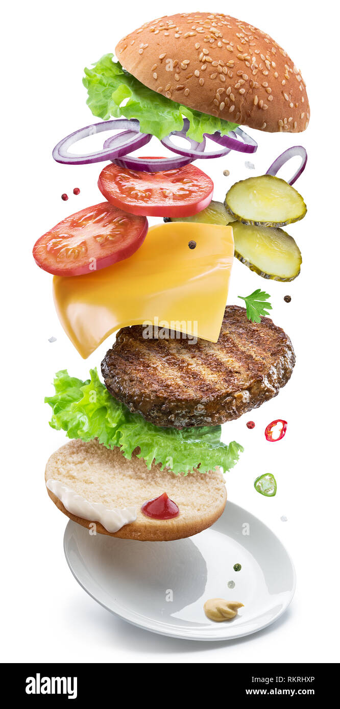 Hamburger ingredients falling down one by one to create a perfect meal ...