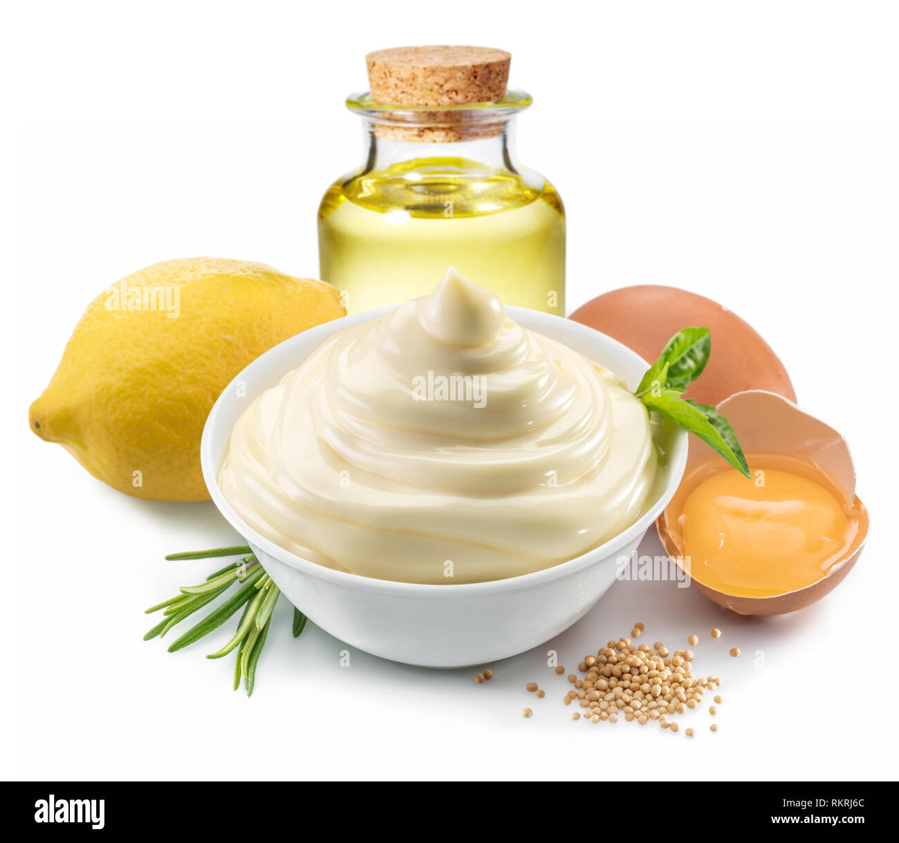 Mayonnaise sauce in white bowl with mayonnaise ingredients on white ...