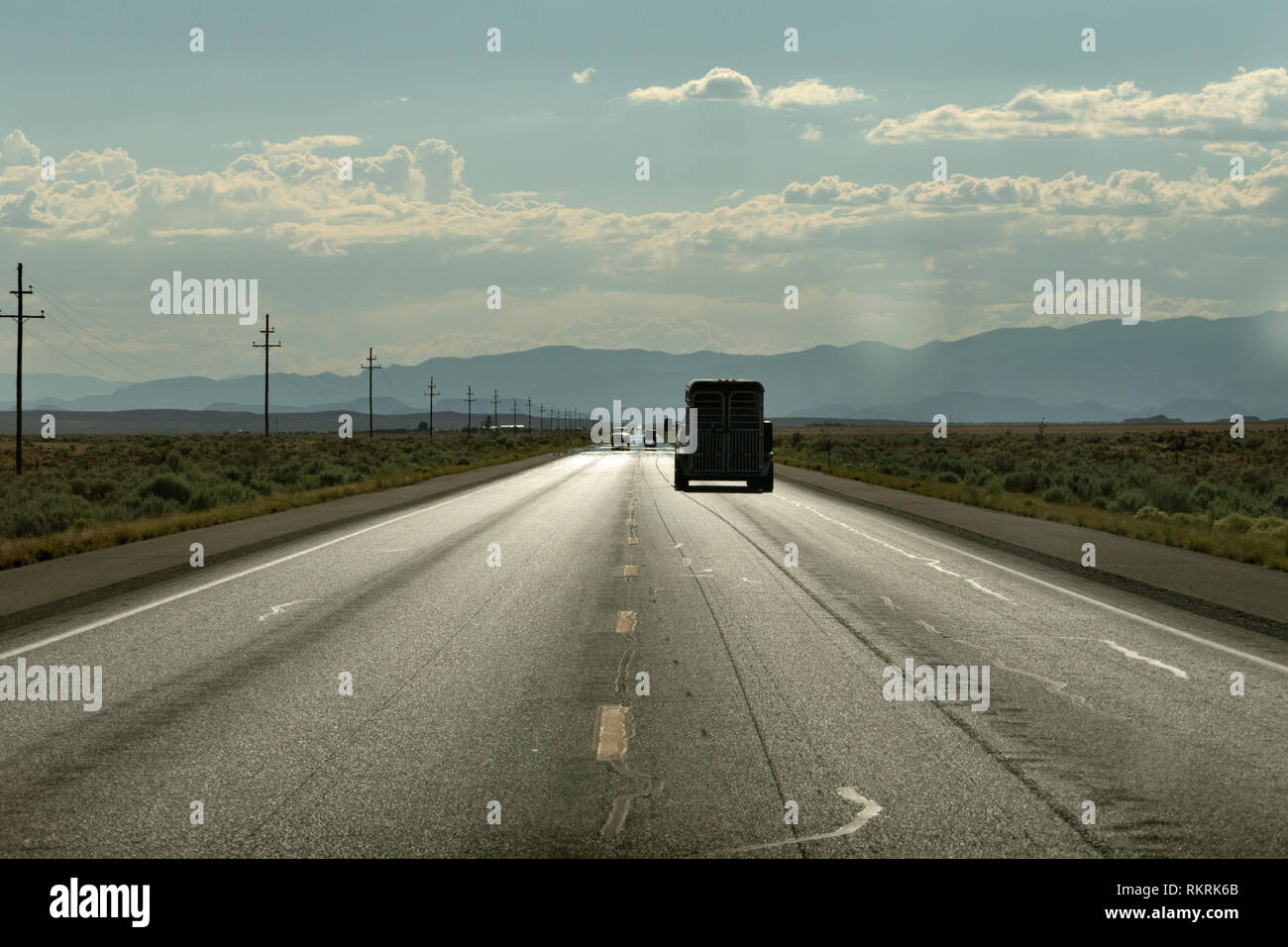 US highway with car in desert in New Mexico, United States of America ...