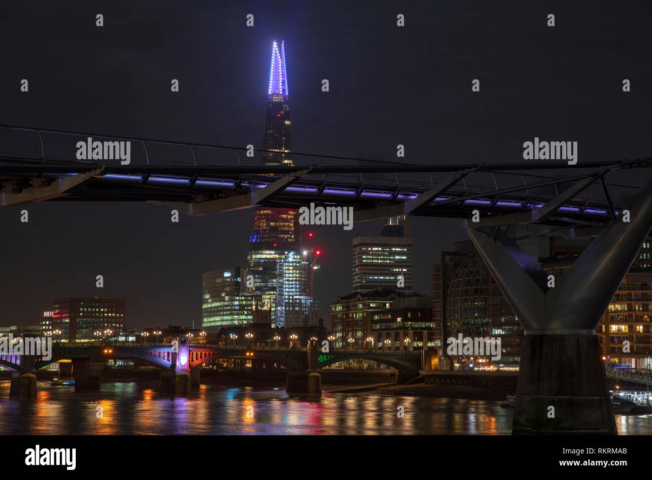 The Shard with special illuminated spire & Millennium Bridge in London ...