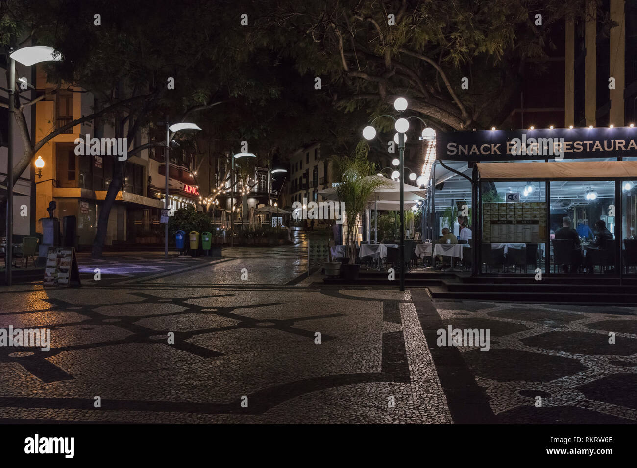 Open air restaurants at night in the Old Town of Funchal, Madeira Stock ...