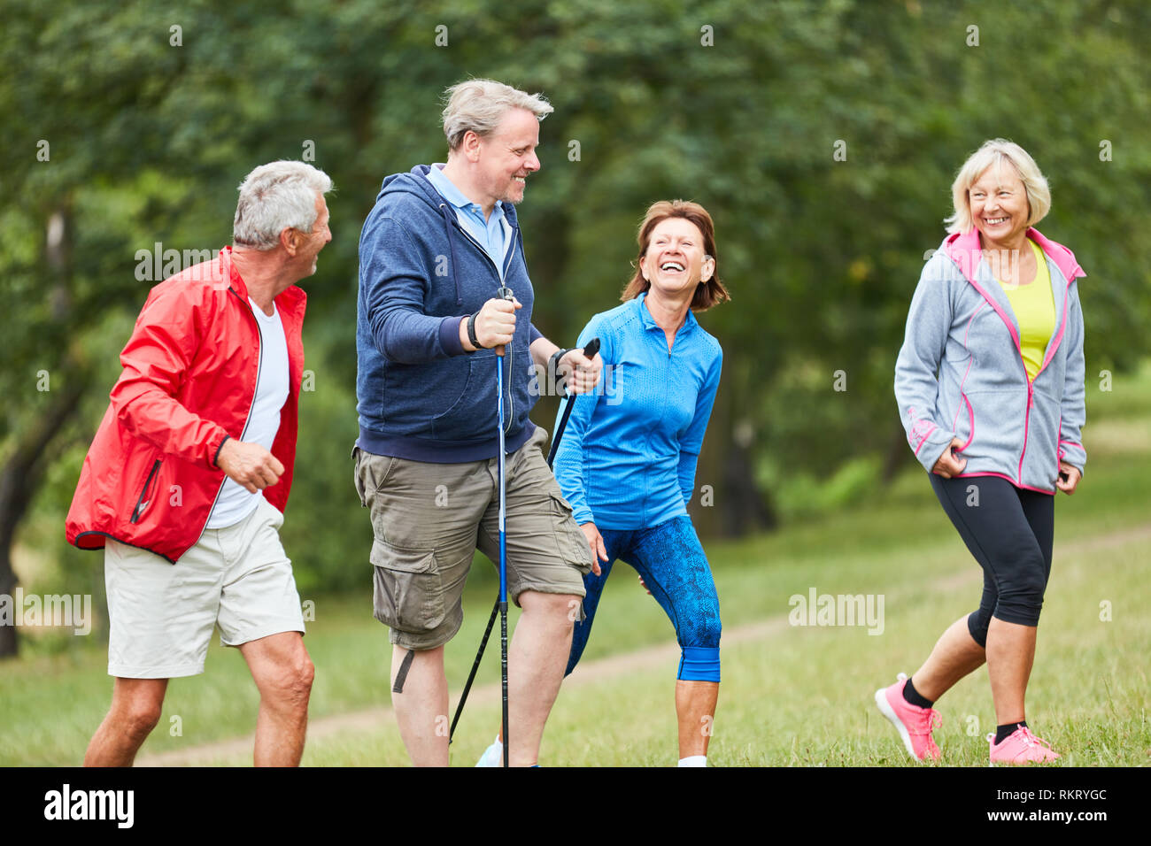 Active seniors in a hiking group traveling together in nature Stock ...