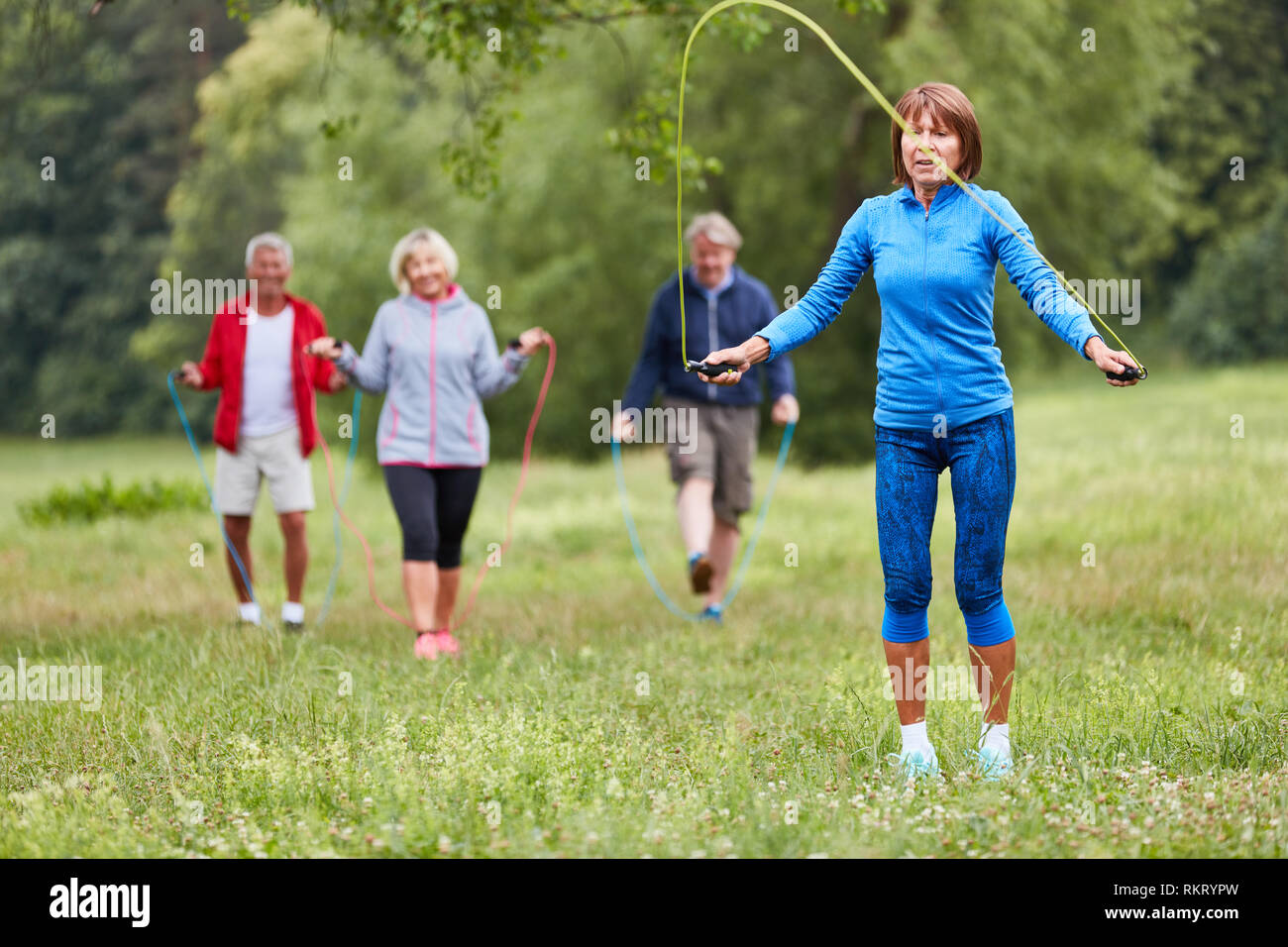 Group jumping skipping rope hi-res stock photography and images - Alamy
