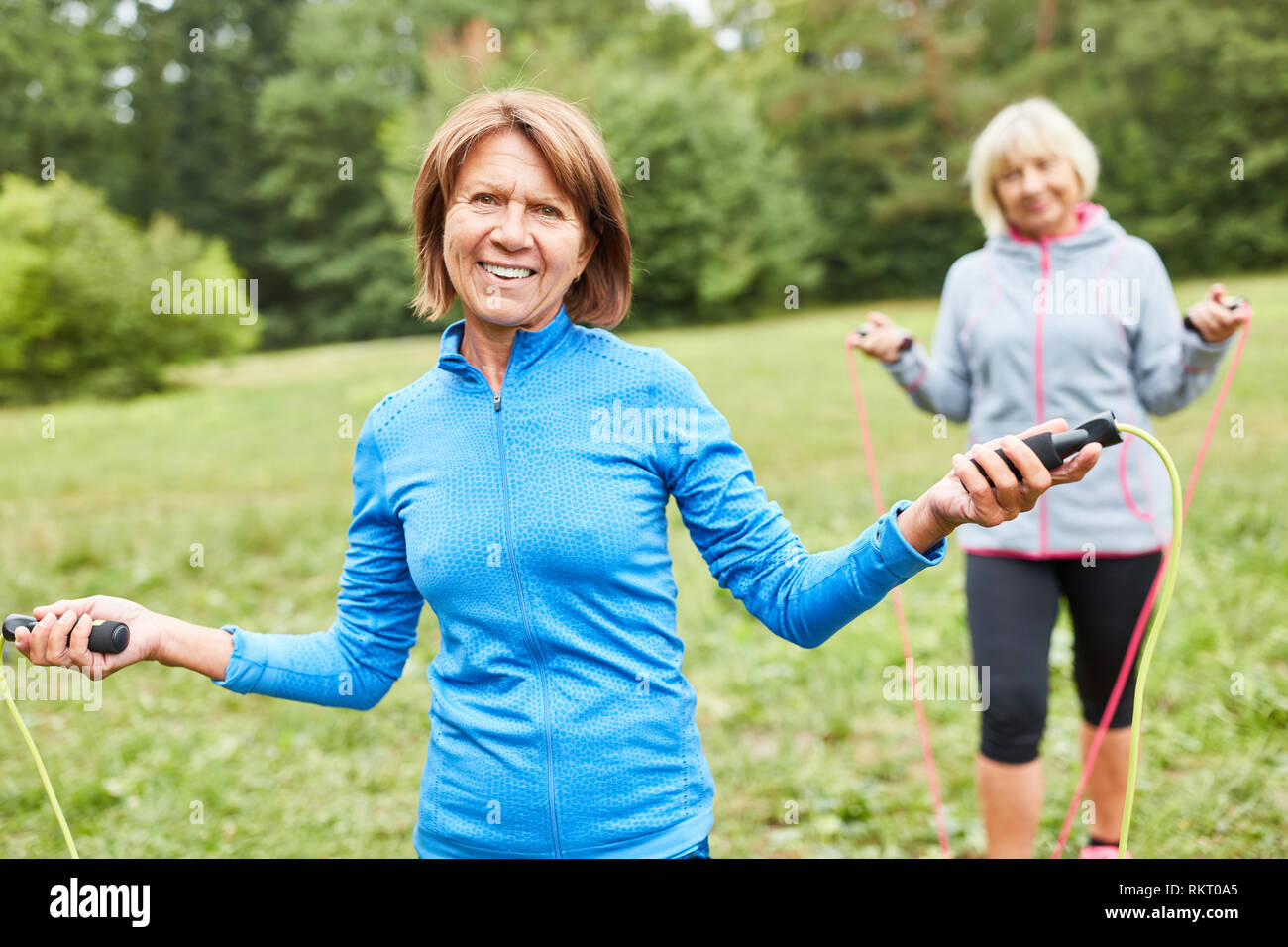 Senior woman jumping rope hi-res stock photography and images - Alamy