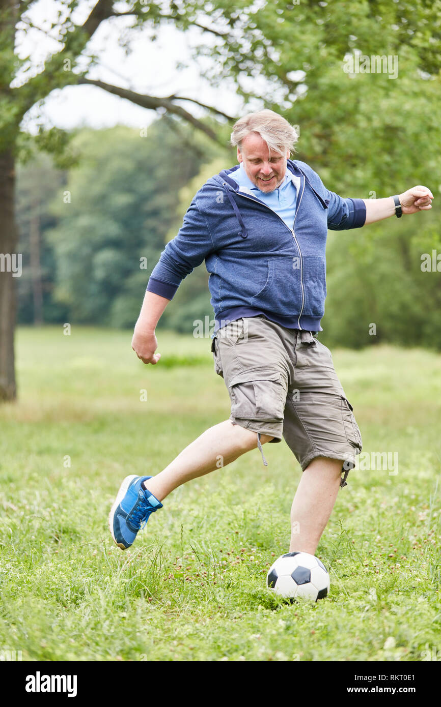 Old man football hi-res stock photography and images - Alamy