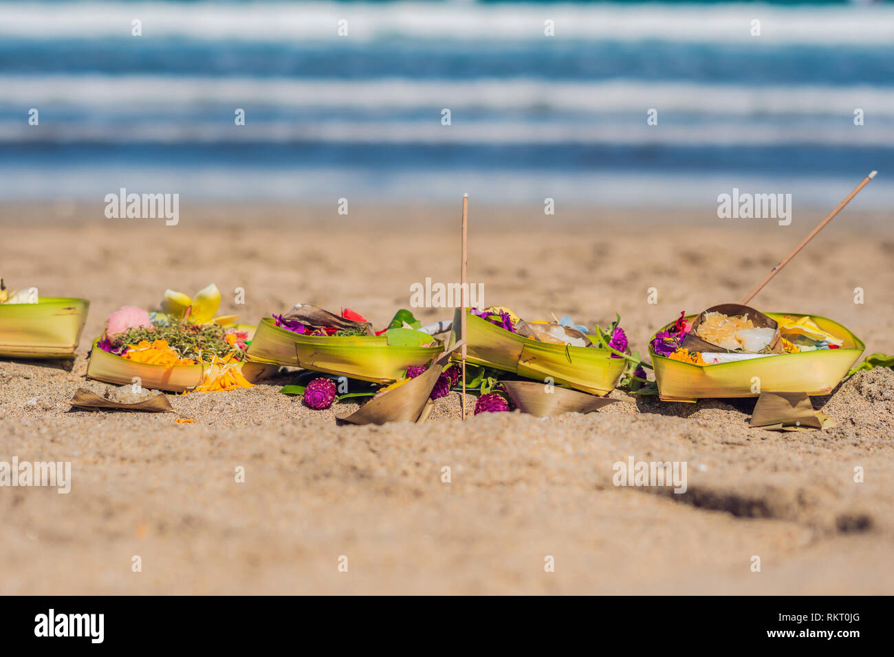 Hindu offerings and gifts to god on the beach in Bali, Indonesia Stock ...