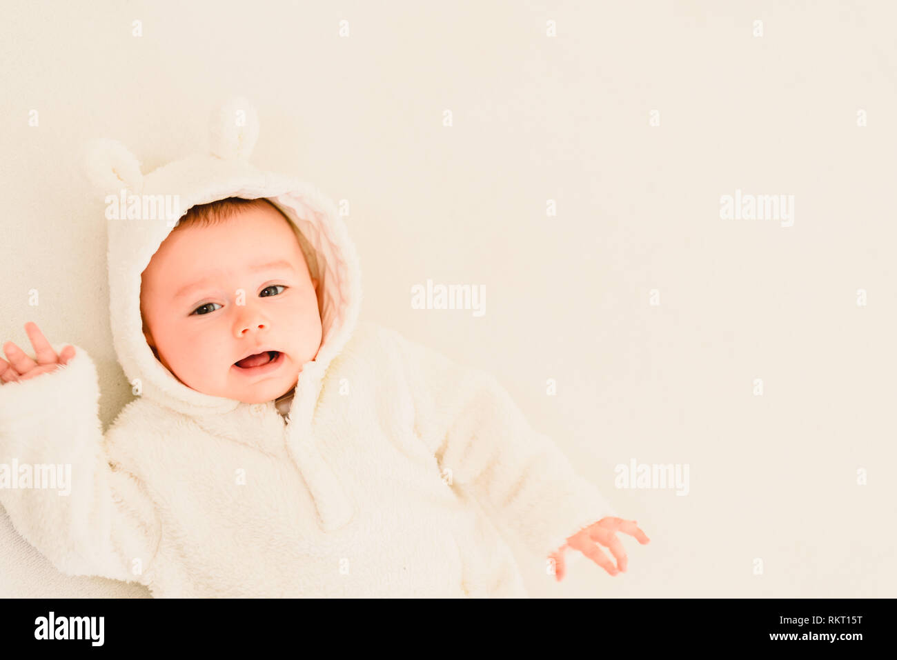 Nice newborn baby laughing Stock Photo - Alamy