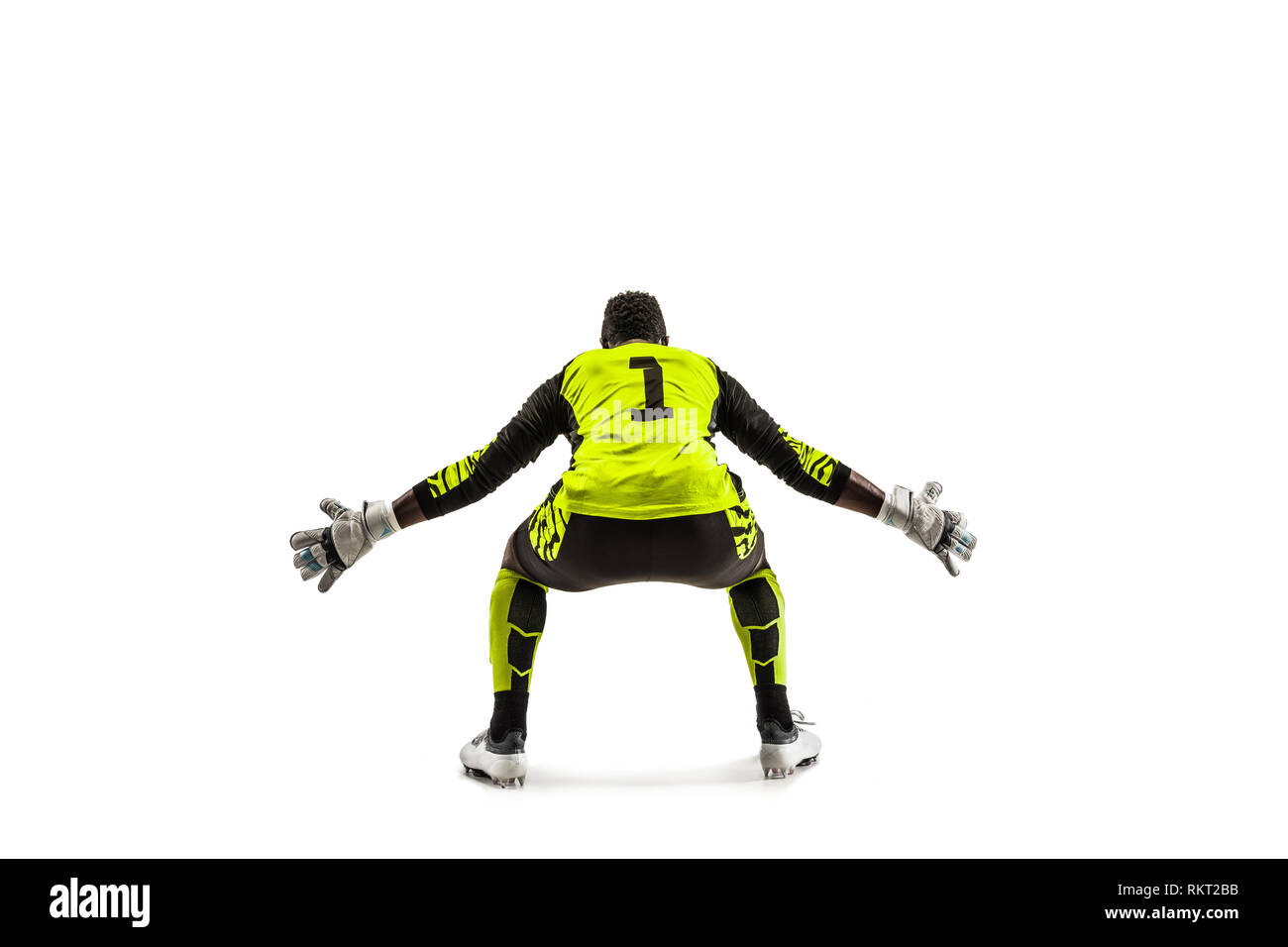 Goalkeeper ready to save on white studio background. Soccer football ...
