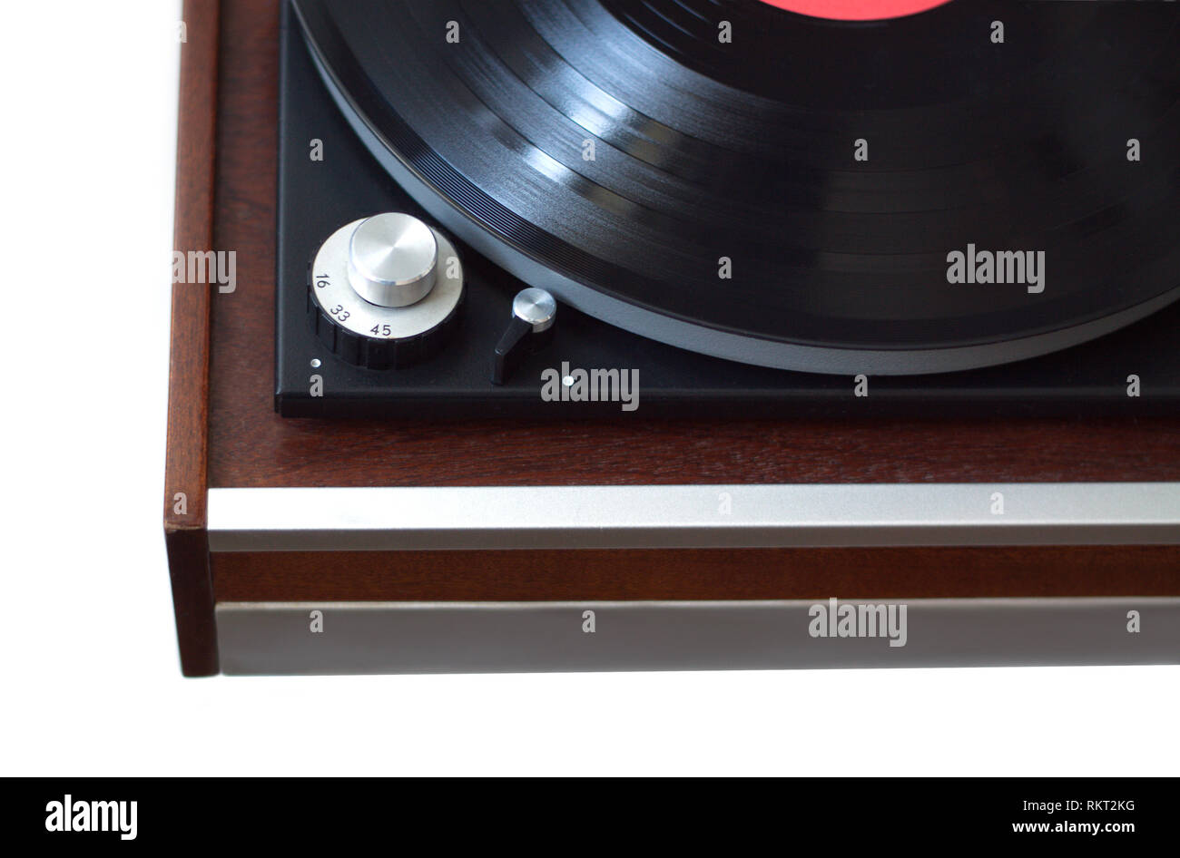 Part of vintage record player with wood finish with black LP vinyl ...