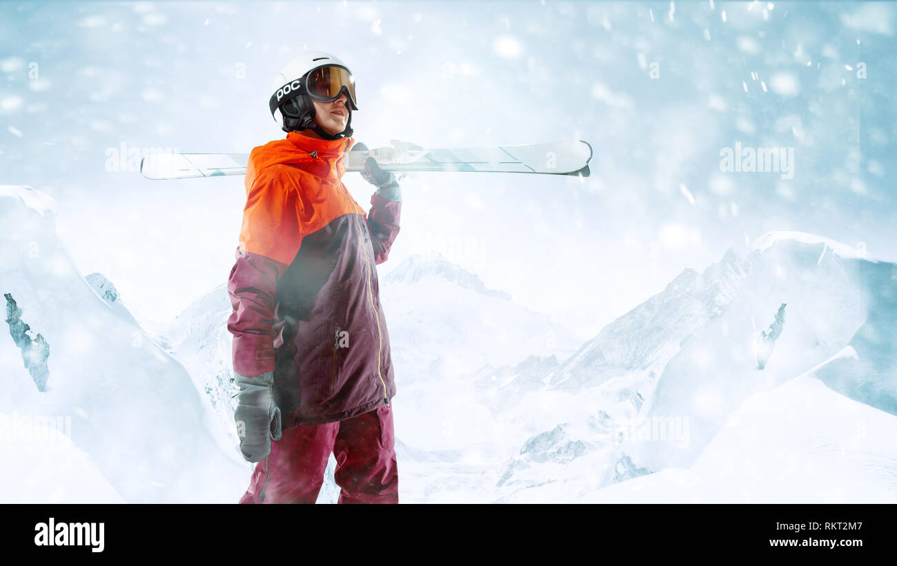 Female skier standing on slope hi-res stock photography and images - Alamy