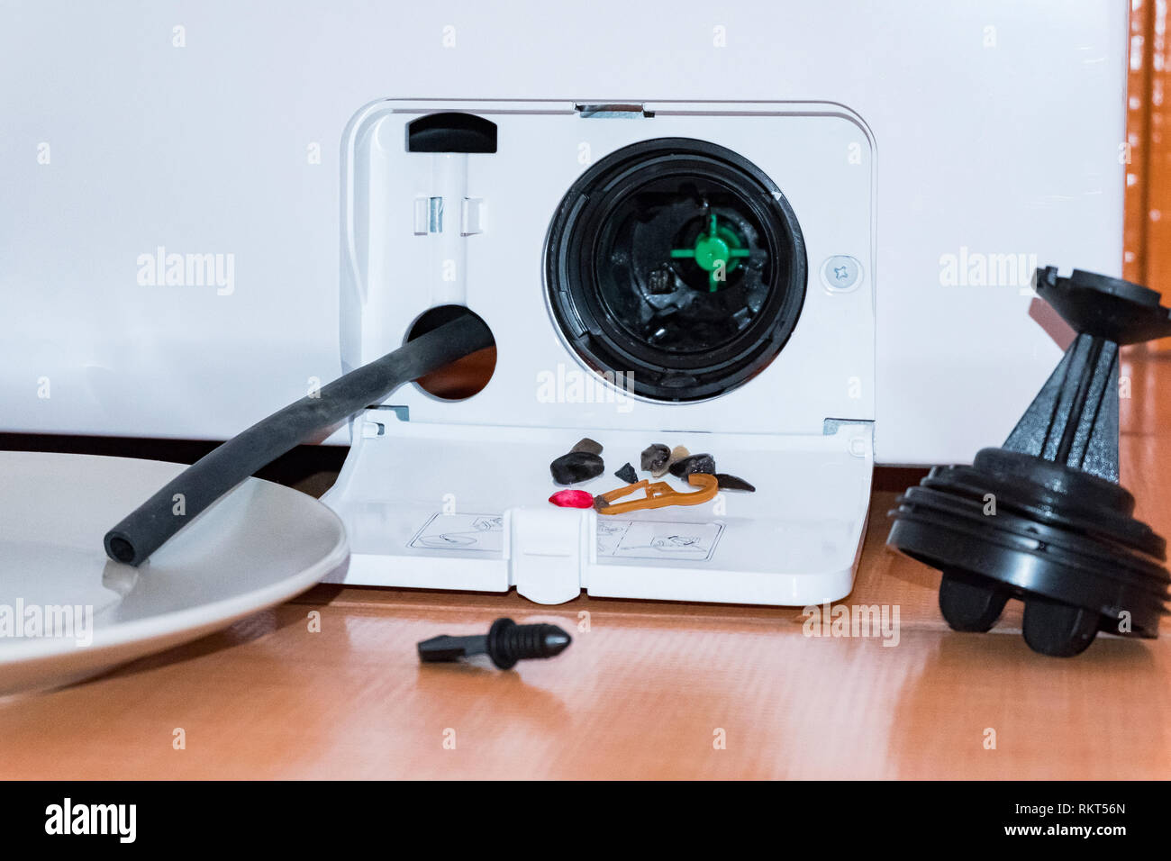 Cleaning the washing machine. How to clean the filter from small parts ...