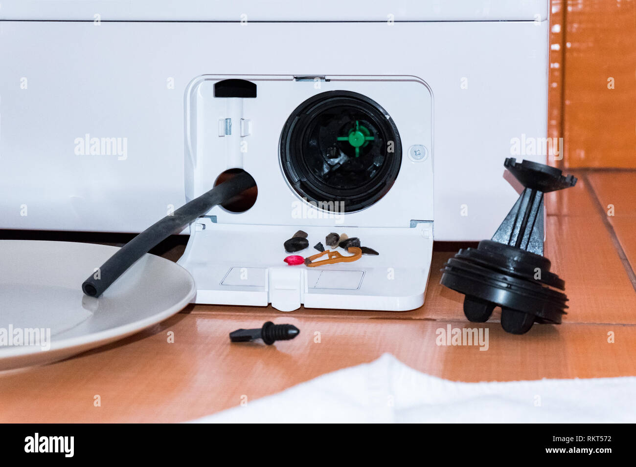 Cleaning the washing machine. How to clean the filter from small parts ...