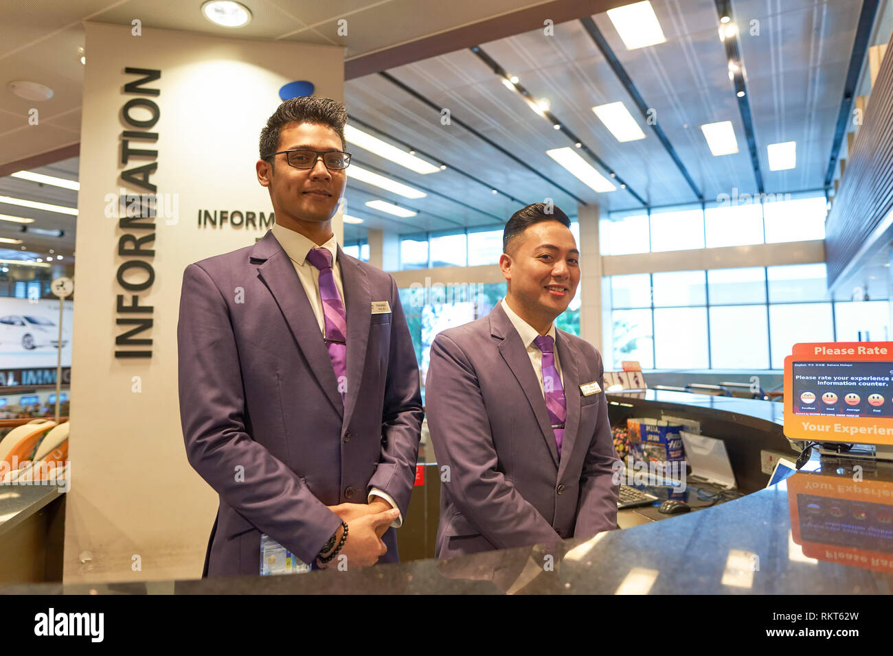 SINGAPORE - SEPTEMBER 12, 2016: portrait of a airport staff at ...