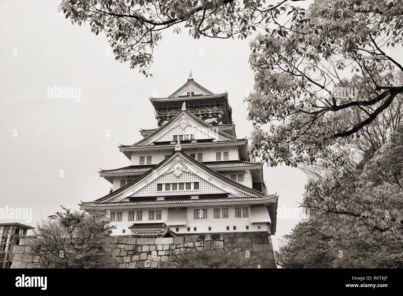 Osaka, Japan - city in the region of Kansai. Osaka-jo castle in sepia ...