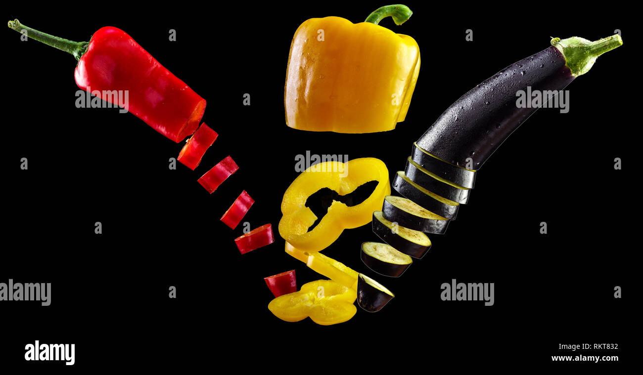 Creative concept with flying vegetables on an black background. Levity ...