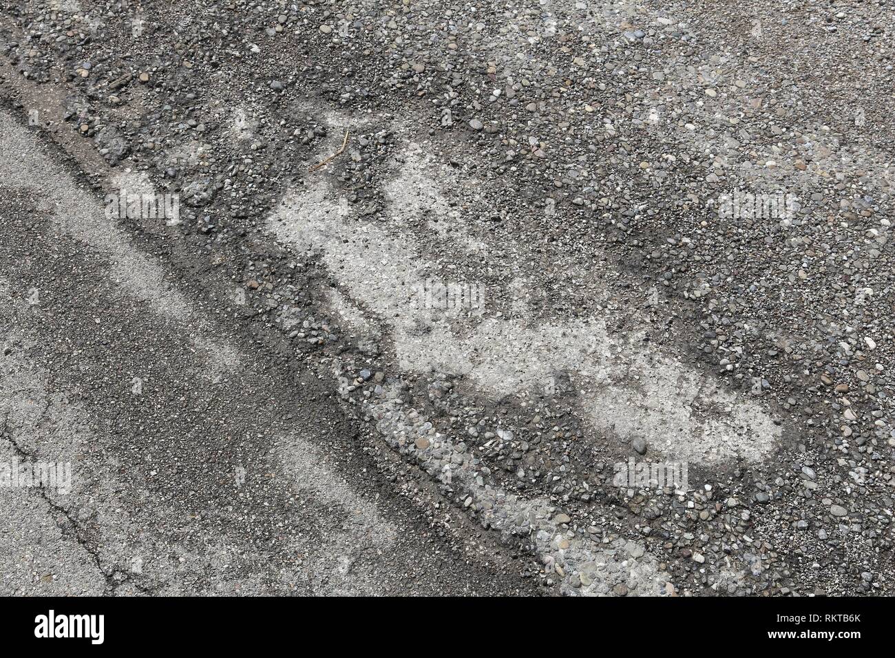 Broken road with cracks in the road surface hi-res stock photography ...