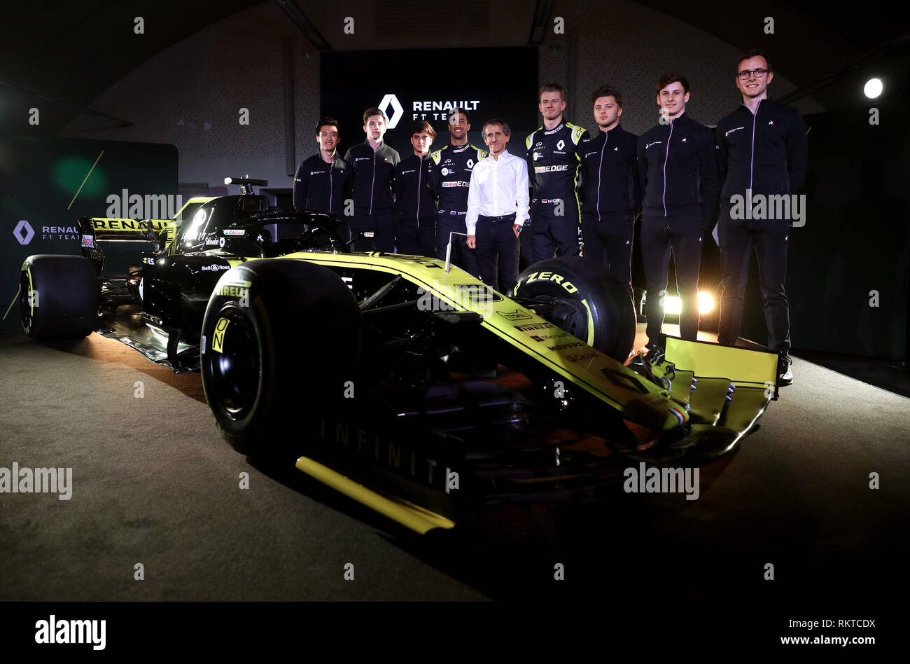 Drivers Nico Hulkenberg (right) and Daniel Ricciardo pose with retired ...