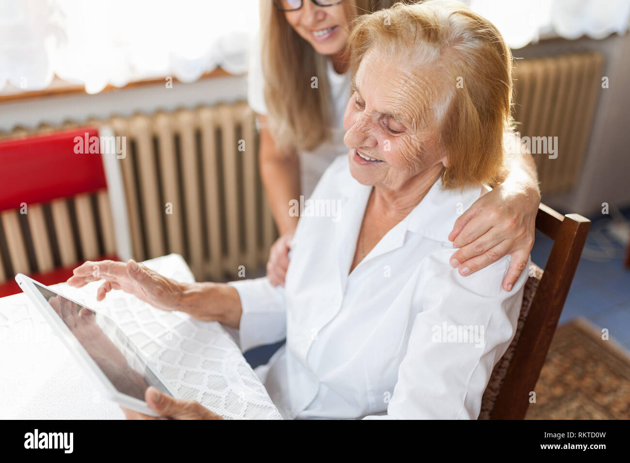 Providing care and support for elderly Stock Photo - Alamy