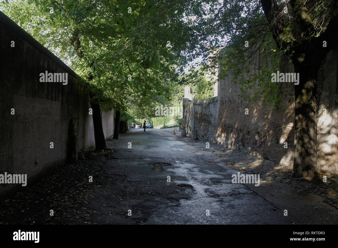 Quiet path in Rome Stock Photo - Alamy