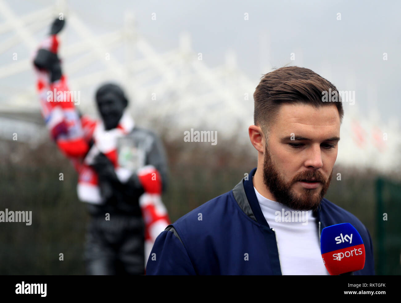 Stoke goalkeeper Jack Butland is interviewed as Tributes are left at ...
