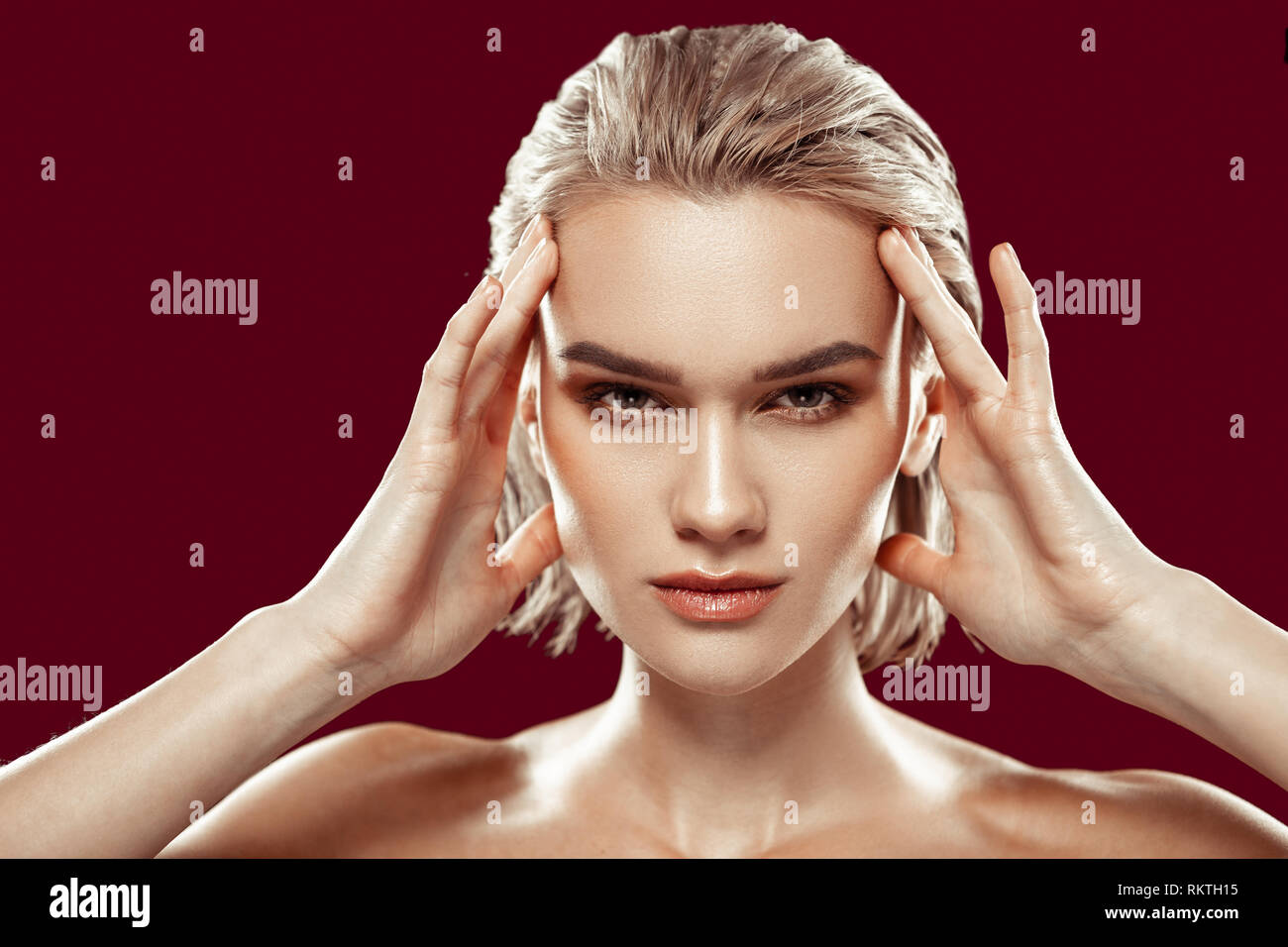 Close up of beautiful appealing young model posing for magazine Stock ...