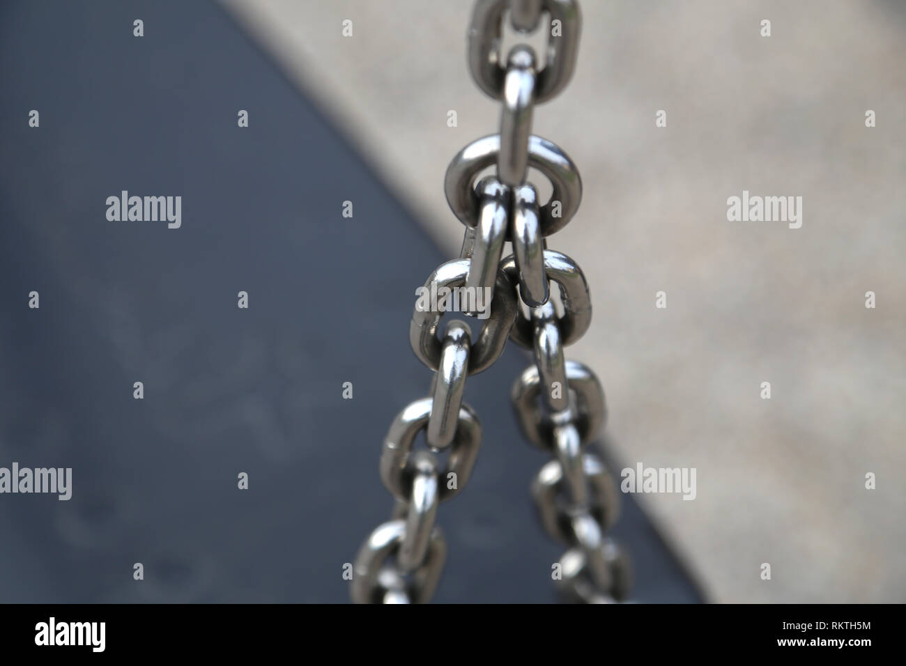 Shiny metal chain close up Stock Photo - Alamy