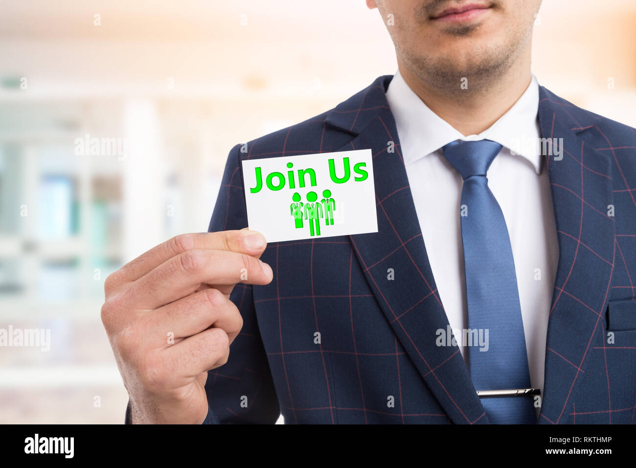 Man holding join us card with people drawing as business hiring concept ...