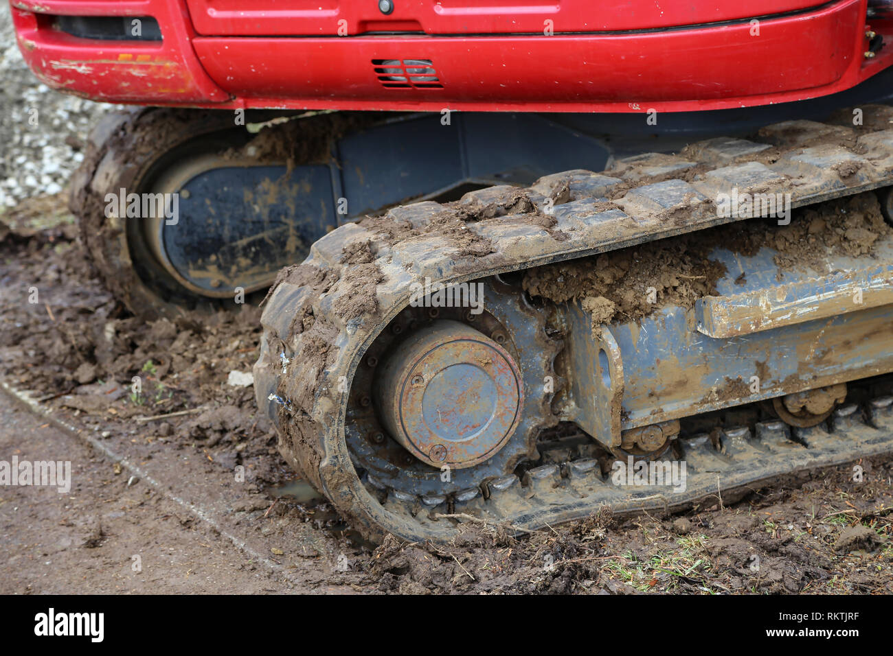 Construction site / Crawler tracks of a small excavator Stock Photo - Alamy