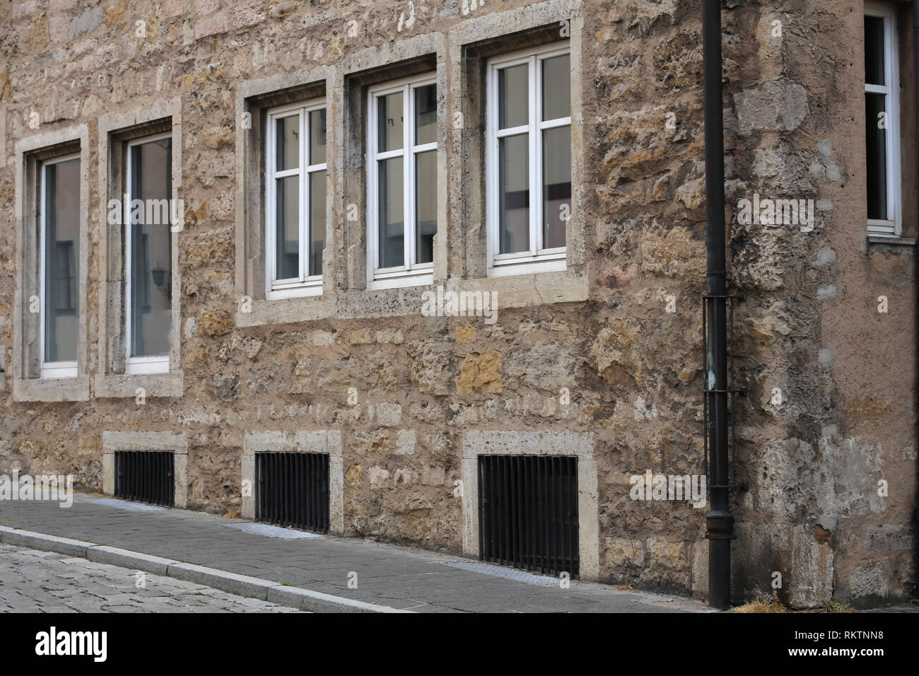 Stone house with windows Stock Photo - Alamy