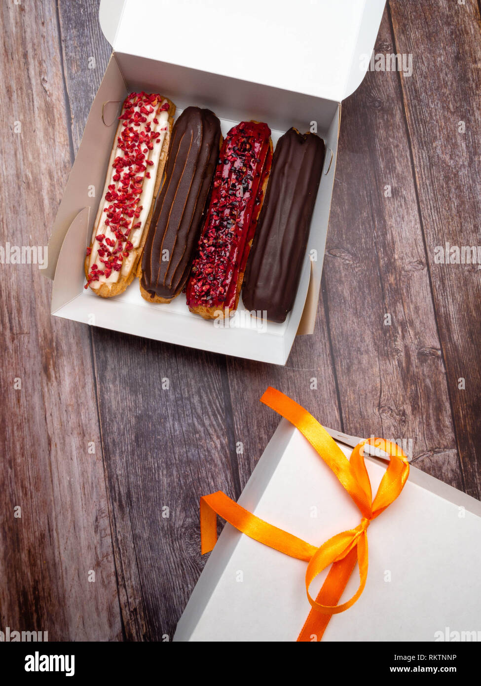 delicious eclairs in a white box, copy space Stock Photo - Alamy