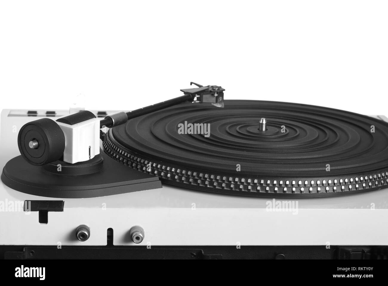 Turntable with right tonearm in silver case with rubber mat on black ...