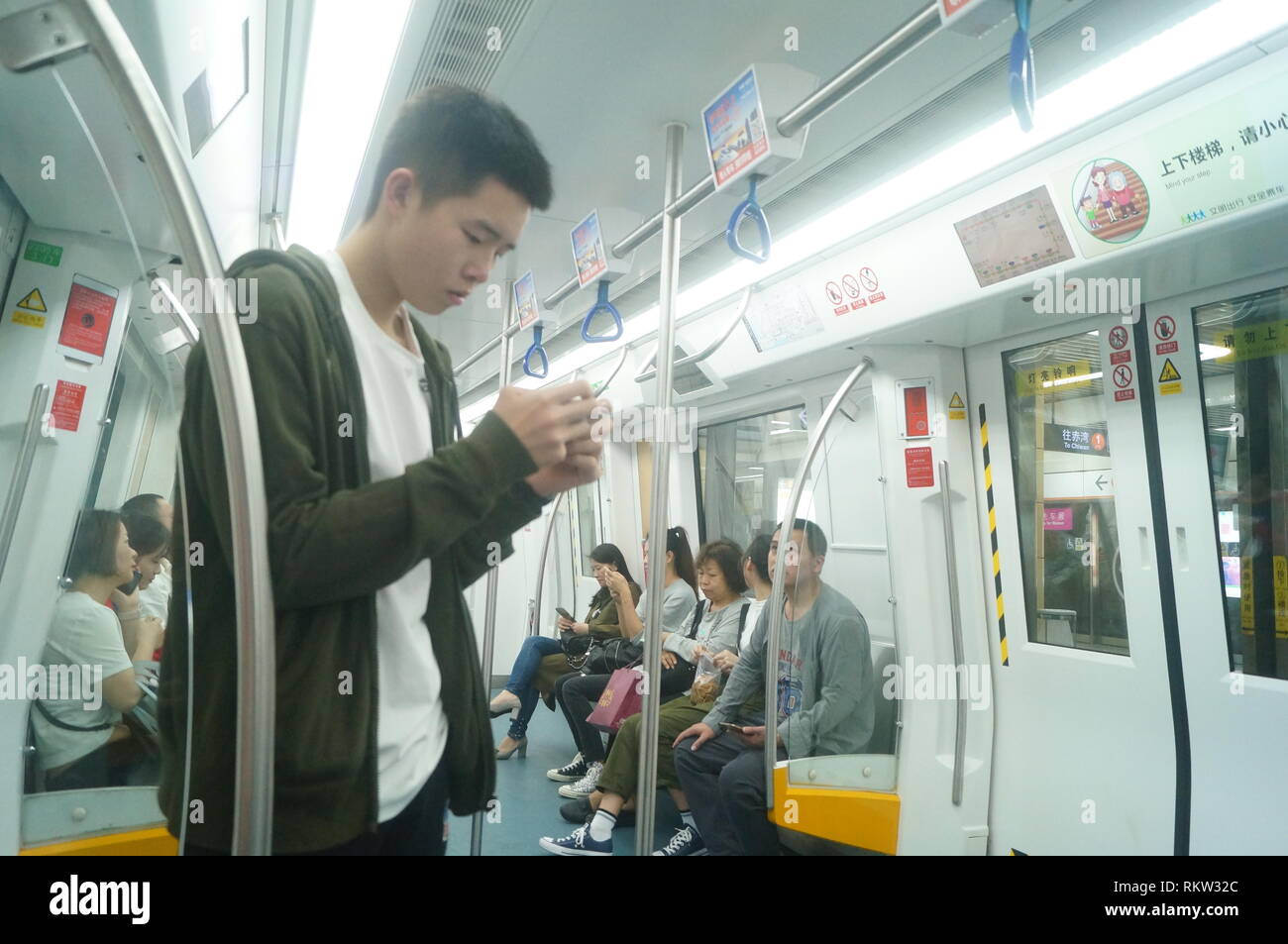 Shenzhen, China: people take the subway Stock Photo - Alamy
