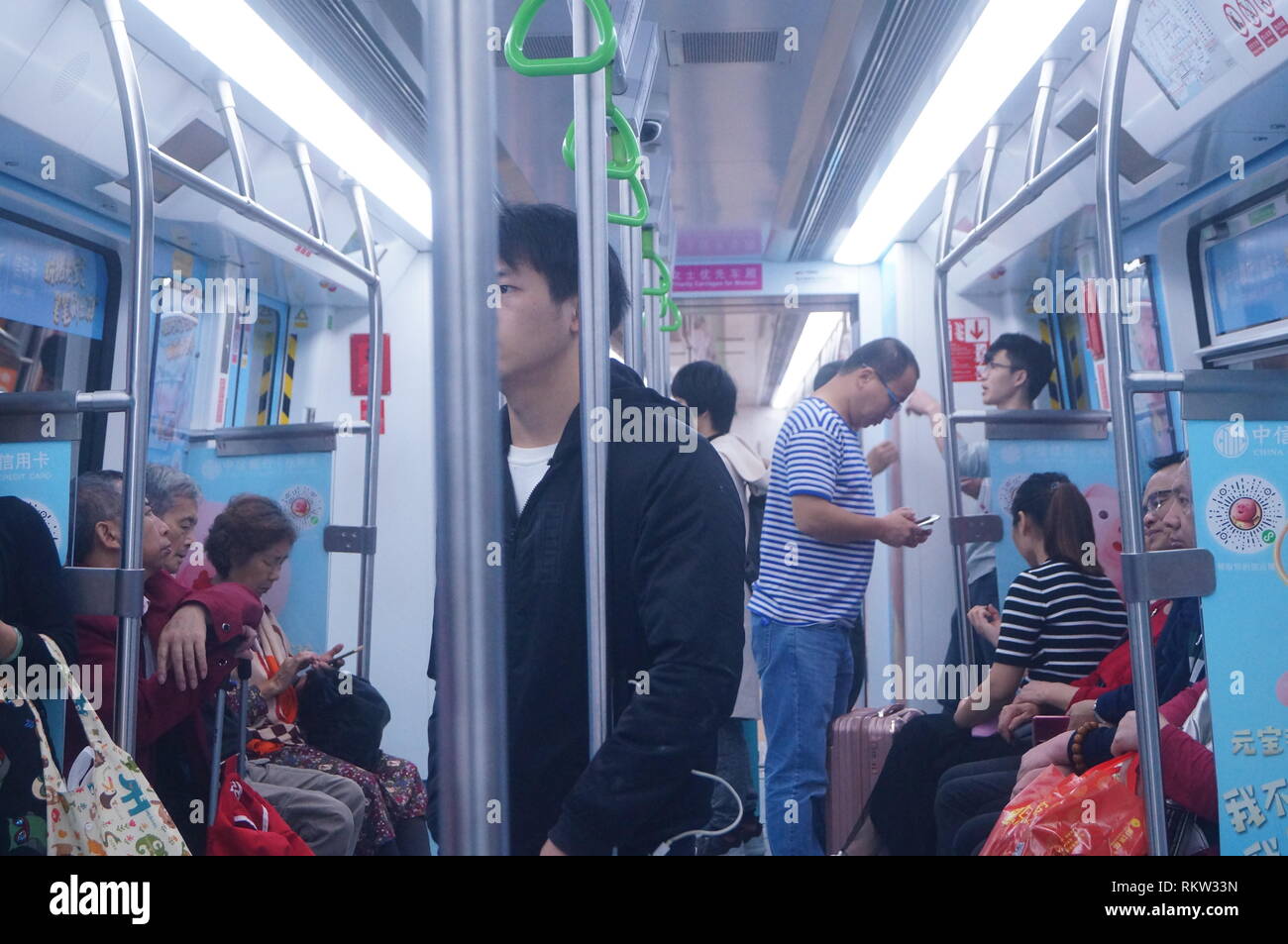 Shenzhen, China: people take the subway Stock Photo - Alamy