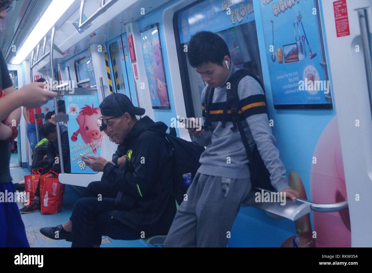 Shenzhen, China: people take the subway Stock Photo - Alamy