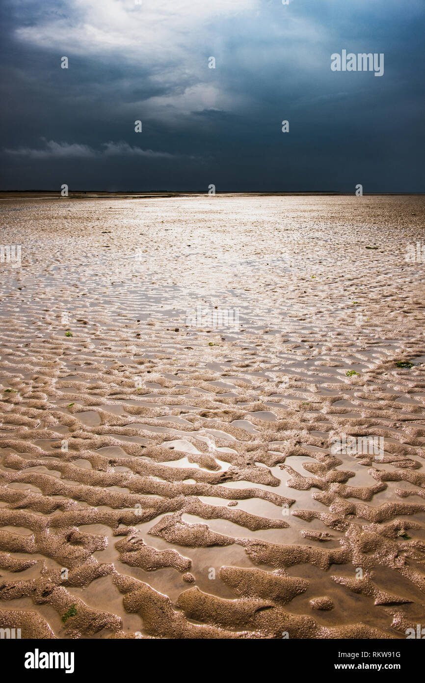 Patterns in the sand at low tide Stock Photo - Alamy