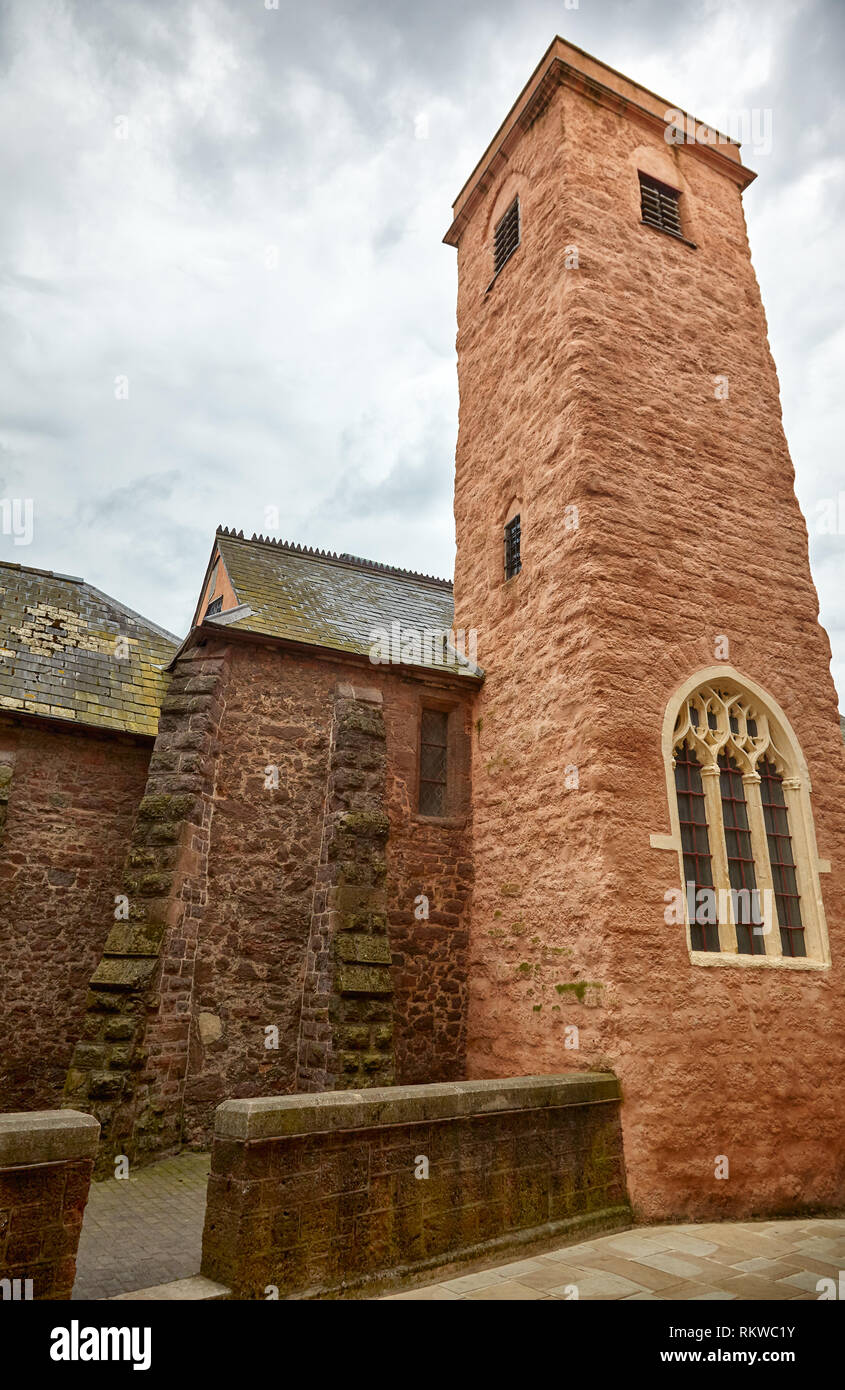 The red brick tower of St Martin's Church in the Exeter Cathedral Close ...
