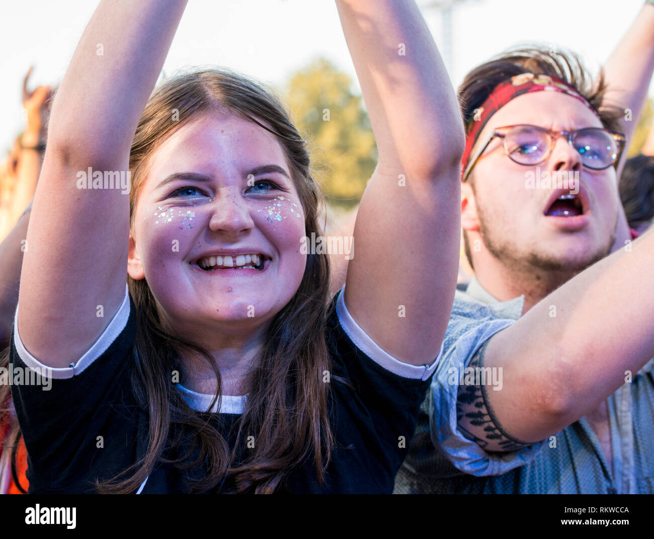 Excited female music fan hi-res stock photography and images - Alamy