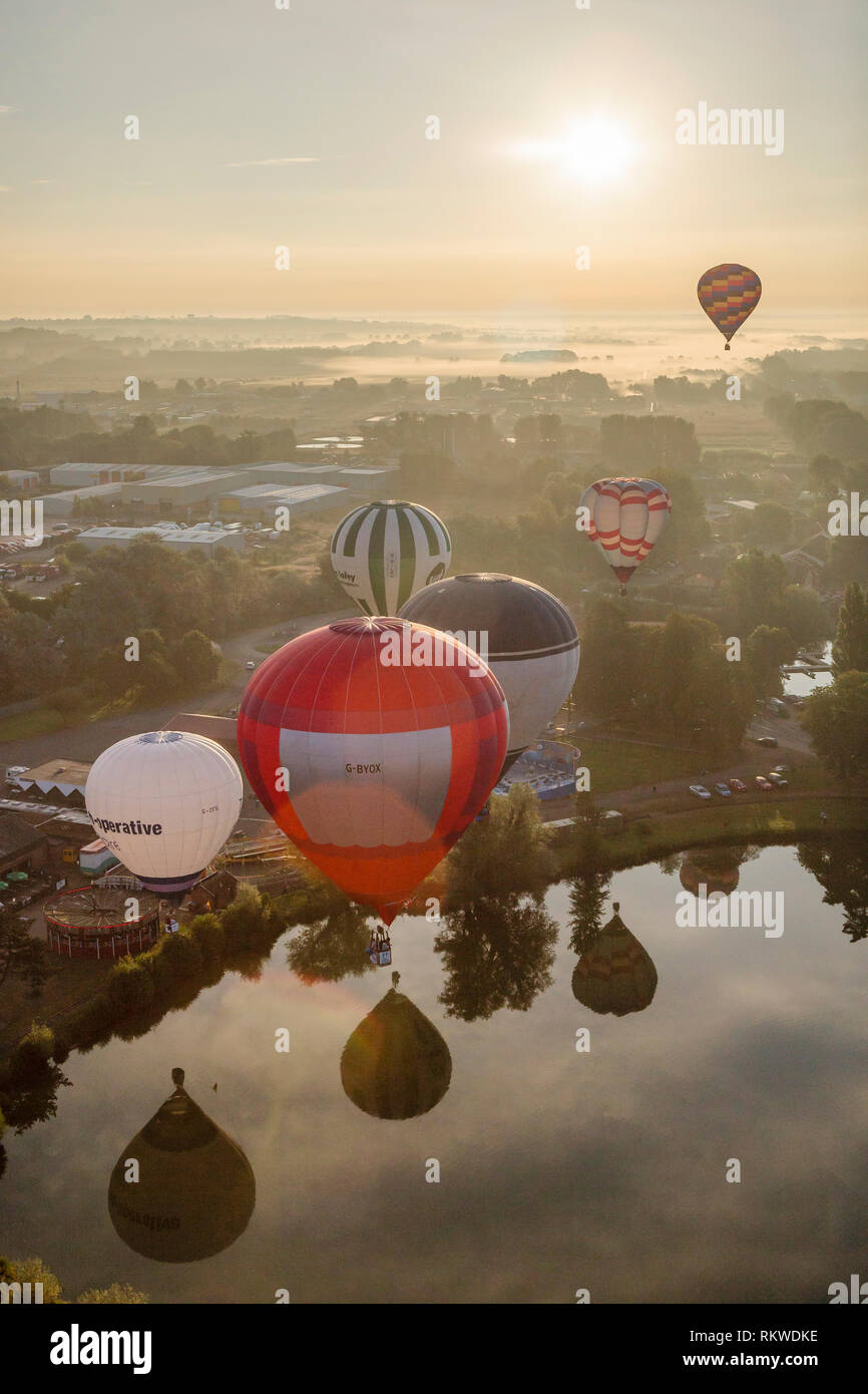 Balloons floating above spectators at the Northampton Balloon Festival ...