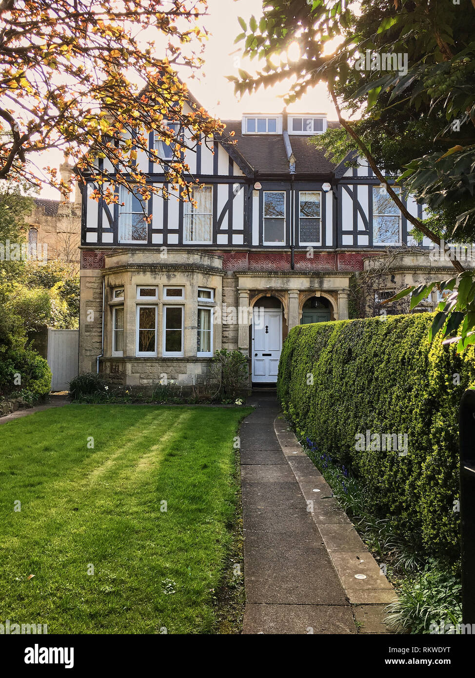 Exterior View and Garden Lawn of a Beautiful Old Rural English Cottage ...