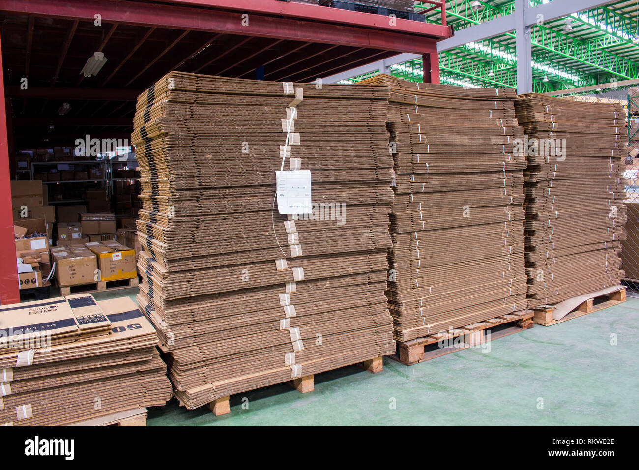 Pile of cardboard in a factory Stock Photo - Alamy