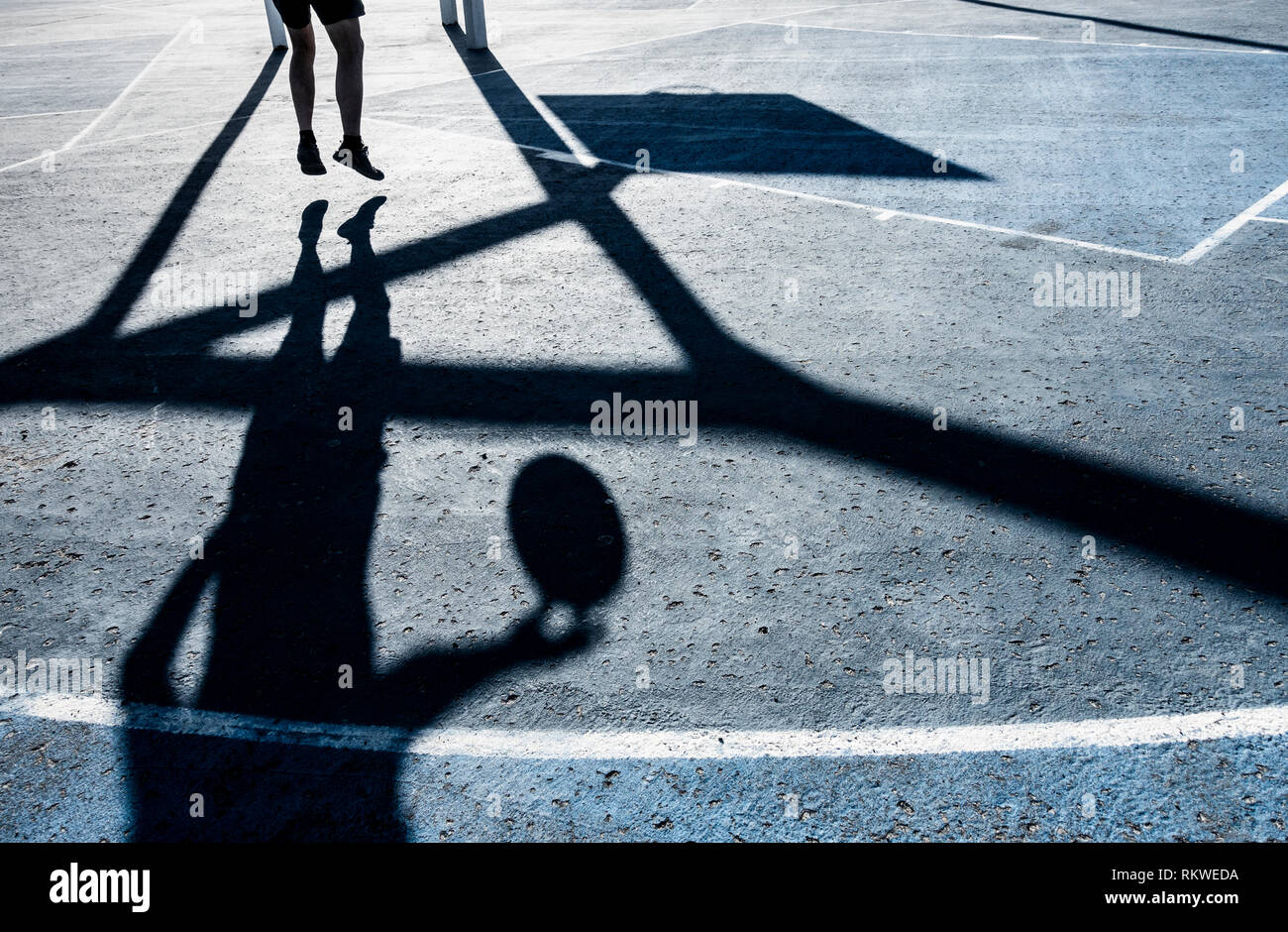 Shadow man playing basketball basketball court hi-res stock photography ...