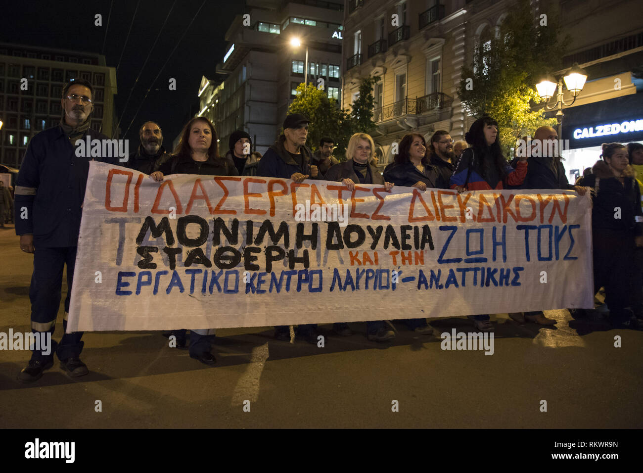 Athens, Greece. 12th Feb, 2019. Protesters hold banners and shout ...