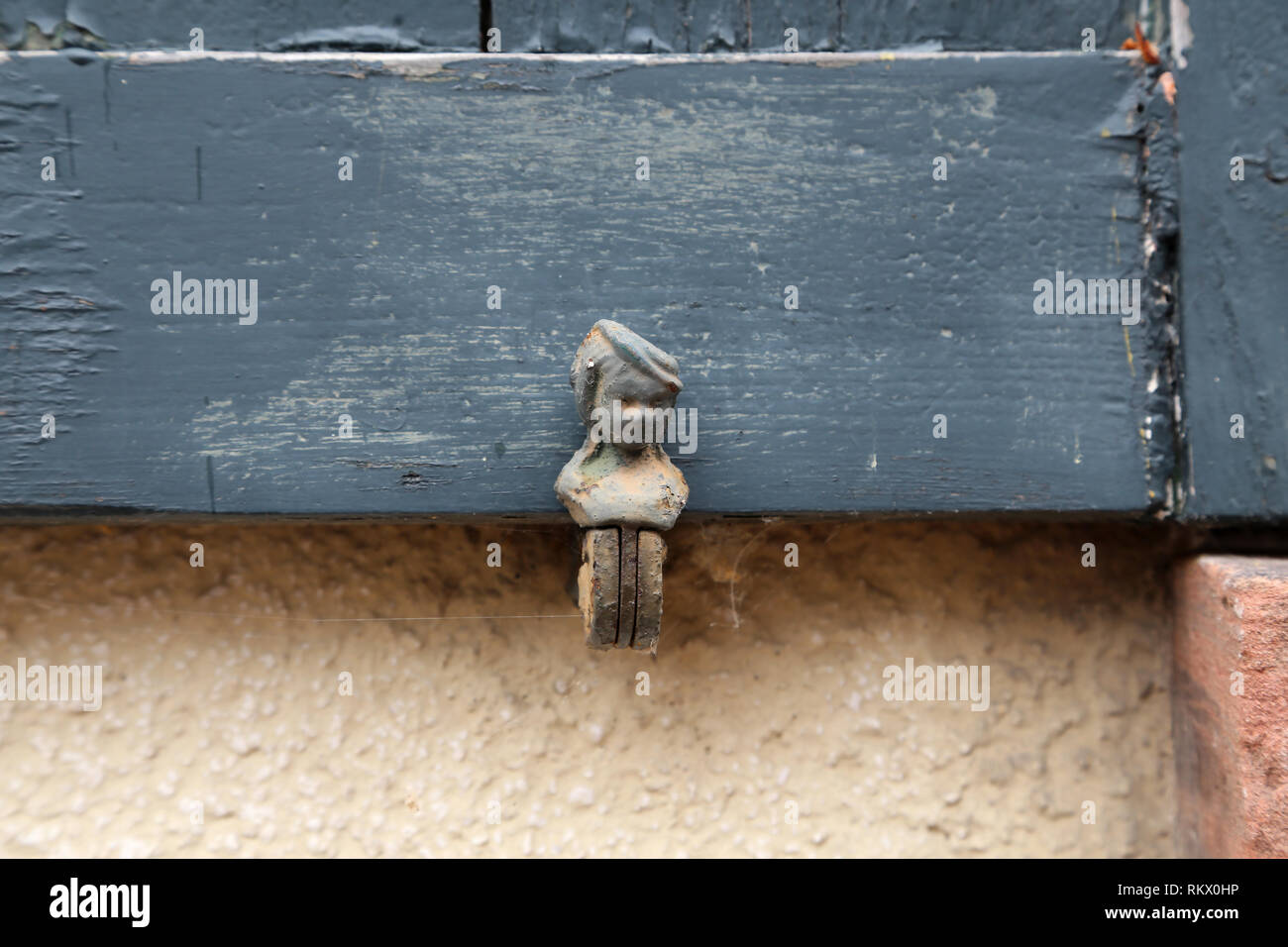 Antique metal window shutter holder in Germany Stock Photo - Alamy