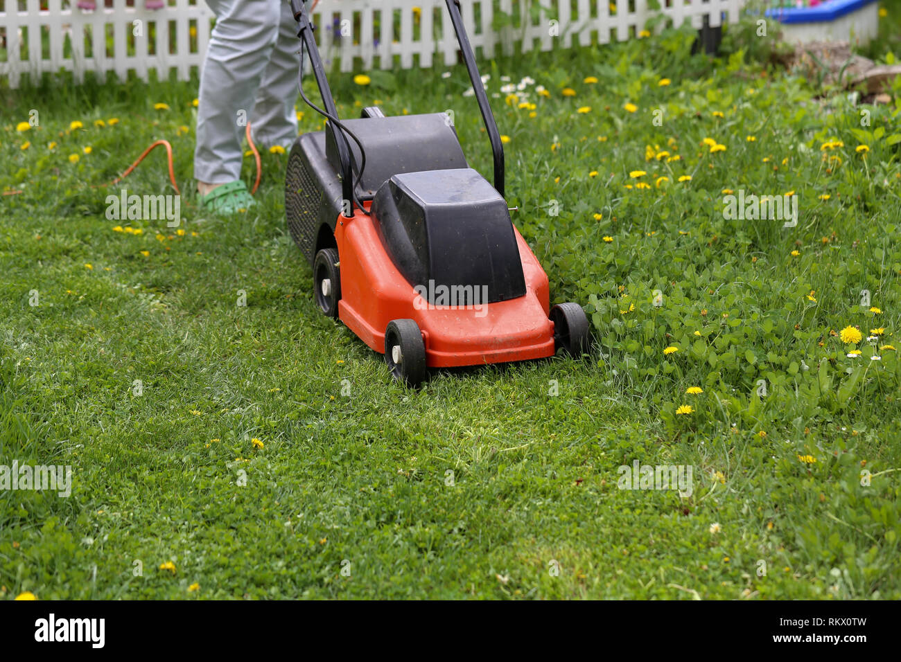 Mowing machine / Mowing the lawn Stock Photo - Alamy