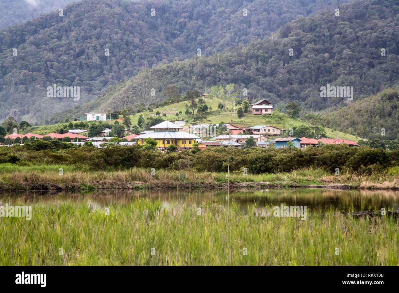 The isolated village of Bario. With rice fields surrounded by mountains ...