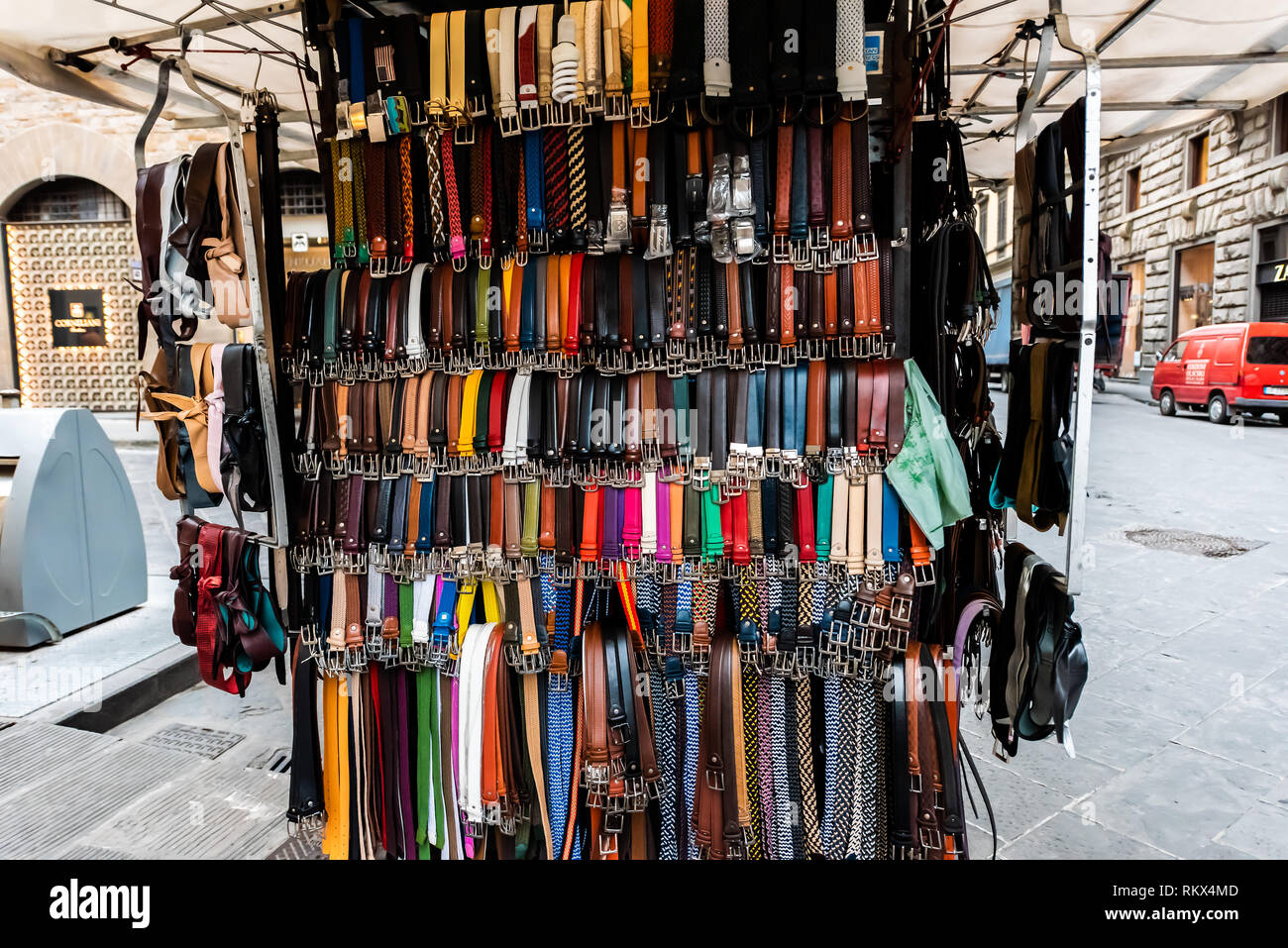 Florence, Italy - August 31, 2018: Closeup pattern of many belts ...